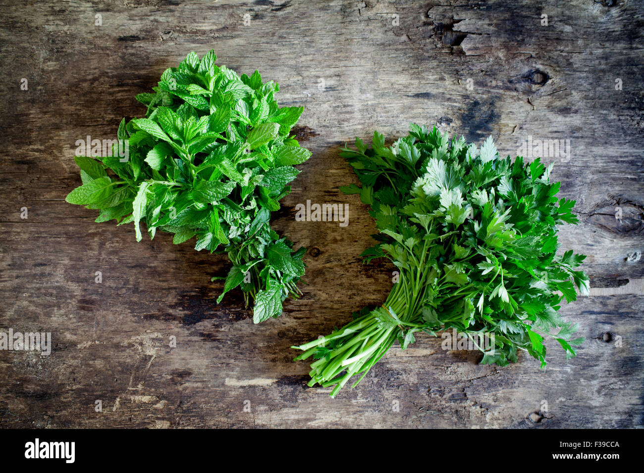 Photograph of bouquets of mint and parsley Stock Photo - Alamy