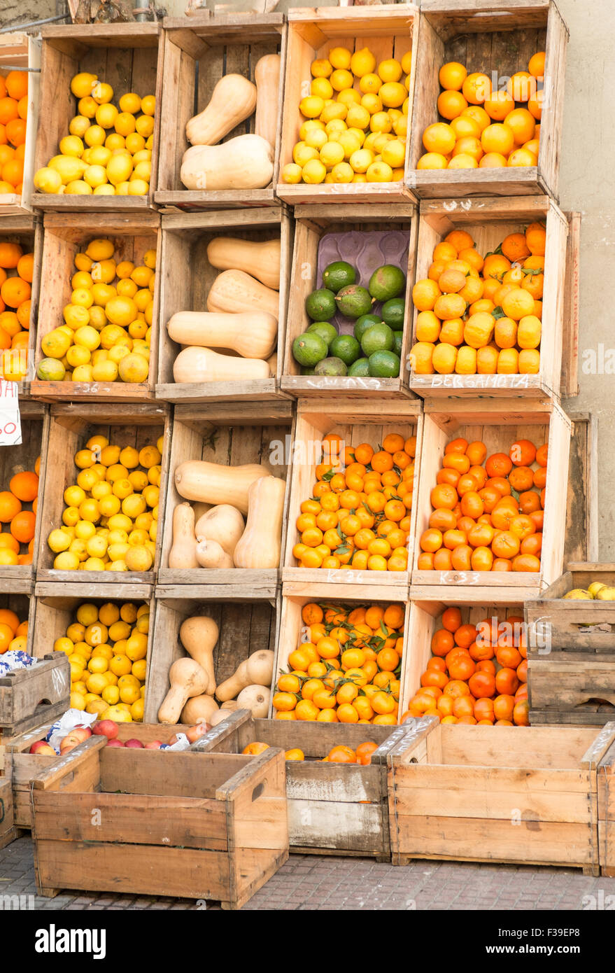 Piled up crates outside of a groceries store Stock Photo - Alamy