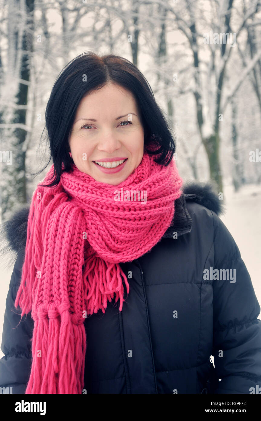 Portrait of a smiling mid adult woman in winter Stock Photo - Alamy