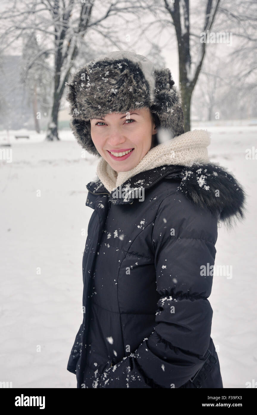 Smiling mid adult woman portrait in winter Stock Photo - Alamy