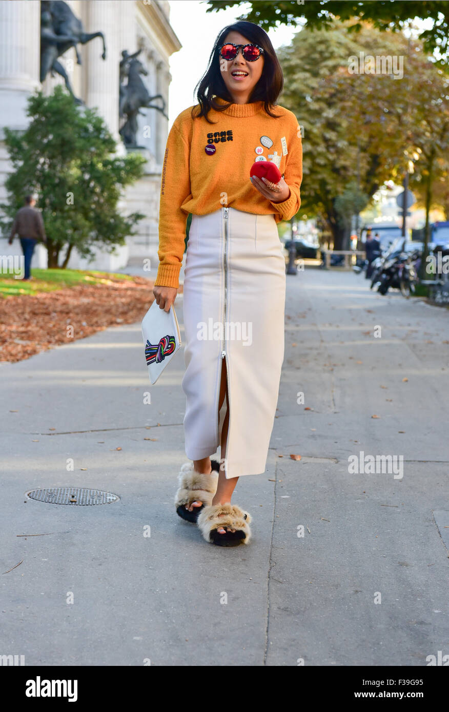 Blogger Yuyu posing outside of the Chloe runway show during Paris ...