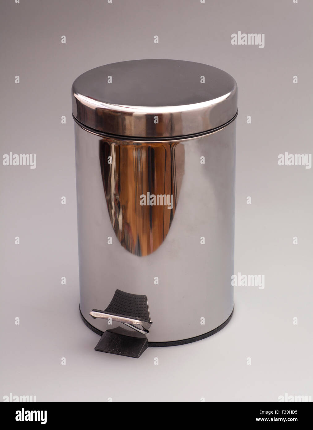 Garbage bin isolated on gray background Stock Photo - Alamy