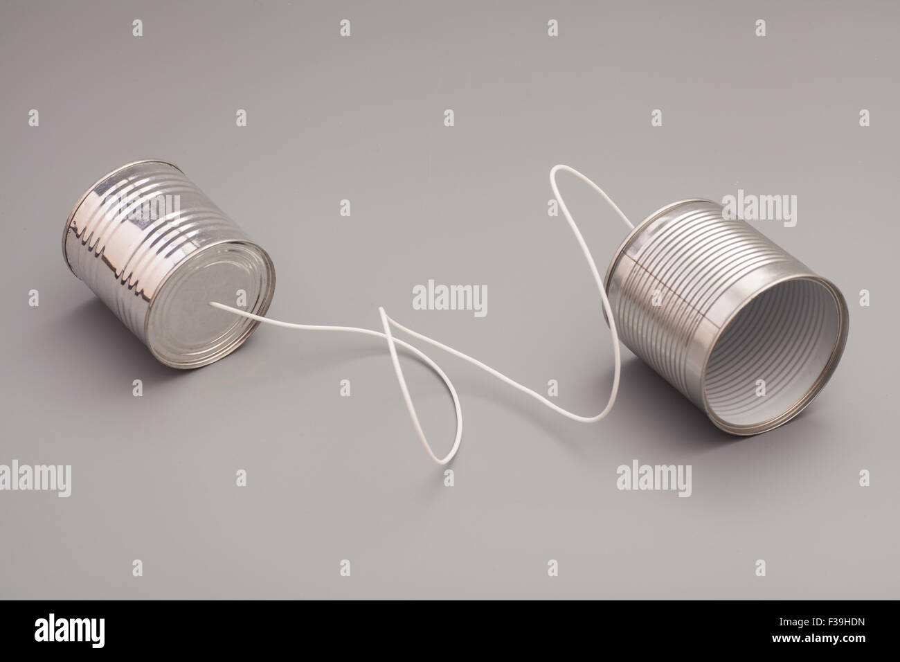 tin can phone.communication concept Stock Photo - Alamy