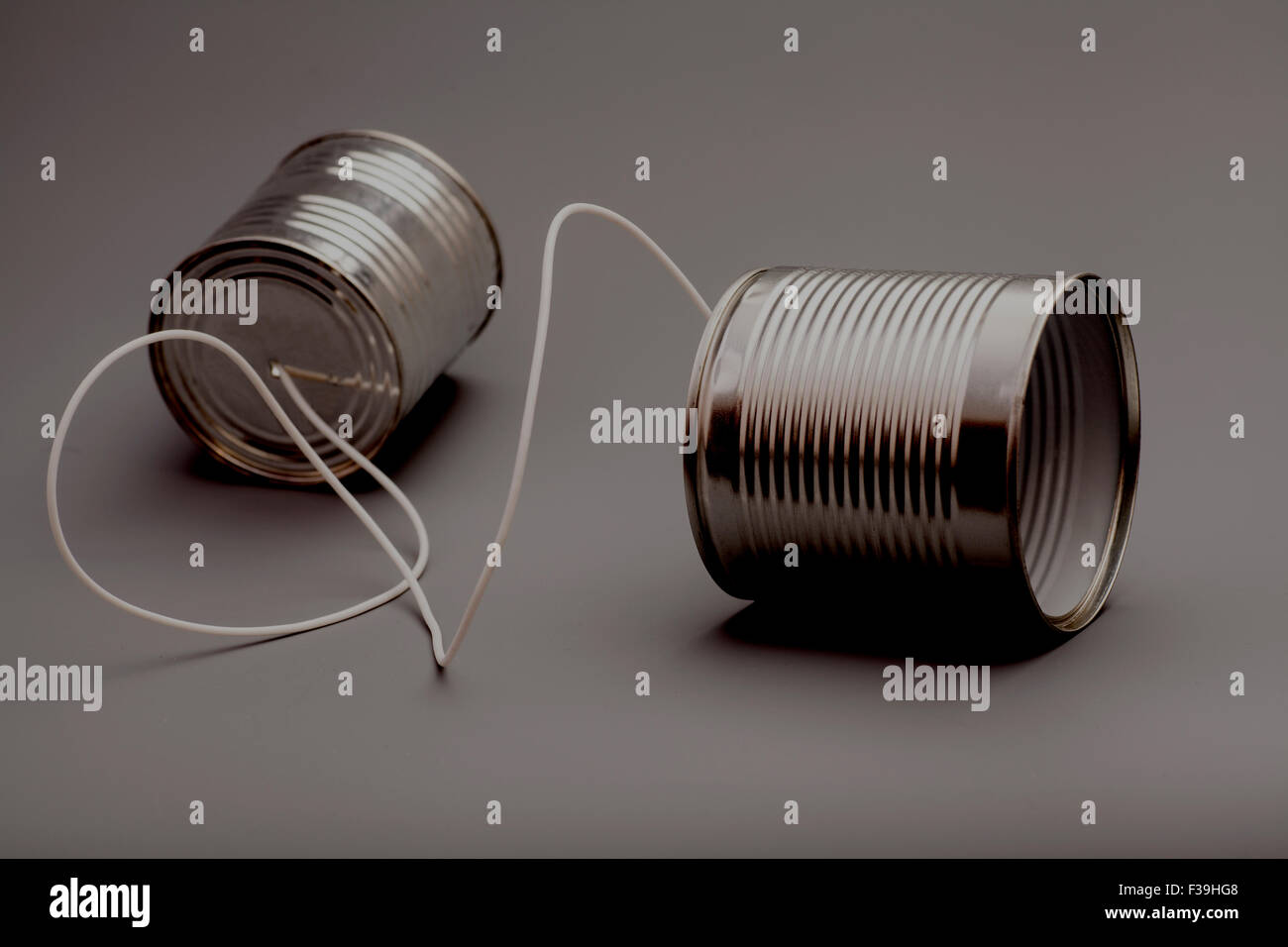 tin can phone.communication concept Stock Photo - Alamy