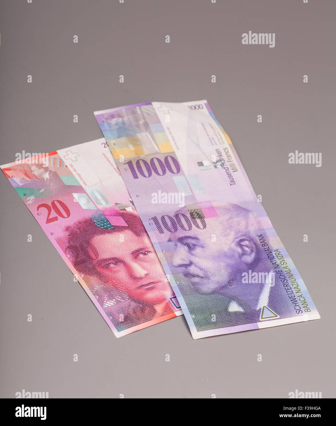 Swiss francs, currency of Switzerland isolated on gray Stock Photo - Alamy