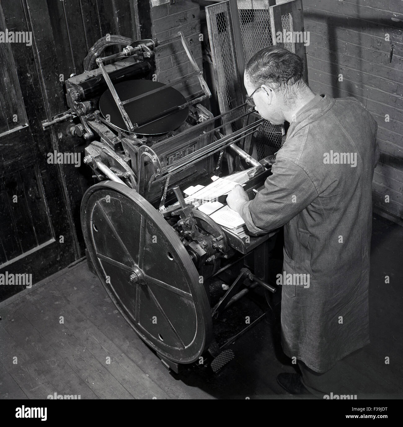 50s fifties inside indoors adult male operative work working machine hi ...
