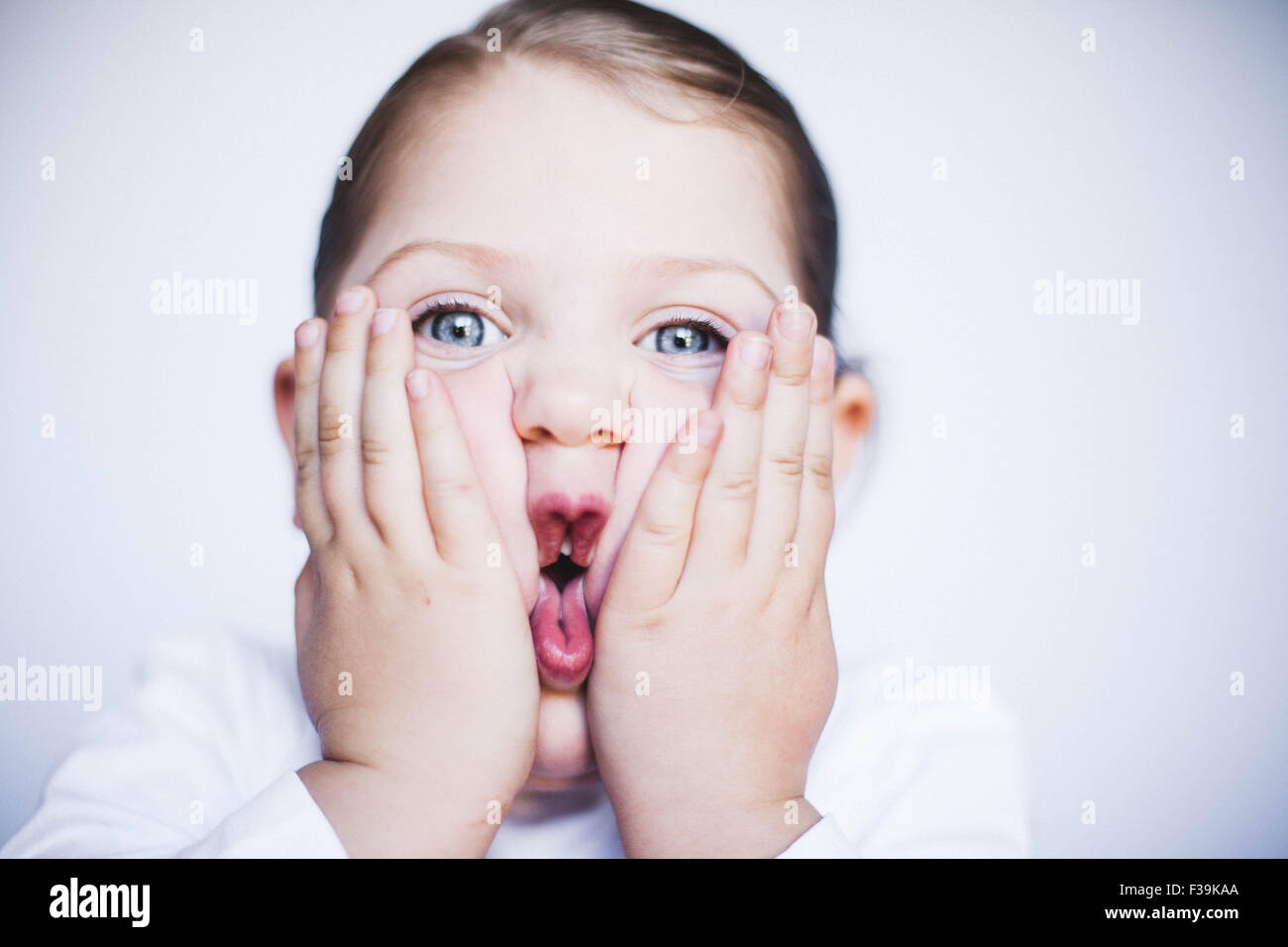 Portrait girl squashing together making hi-res stock photography and ...