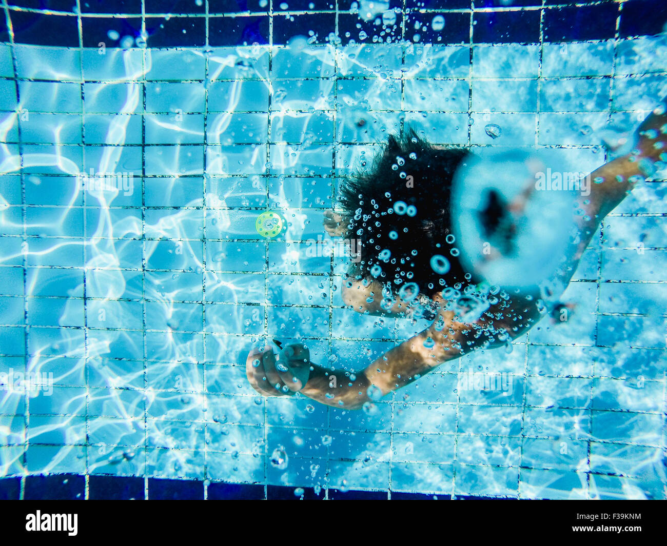 Overhead person swimming in blue water hi-res stock photography and ...