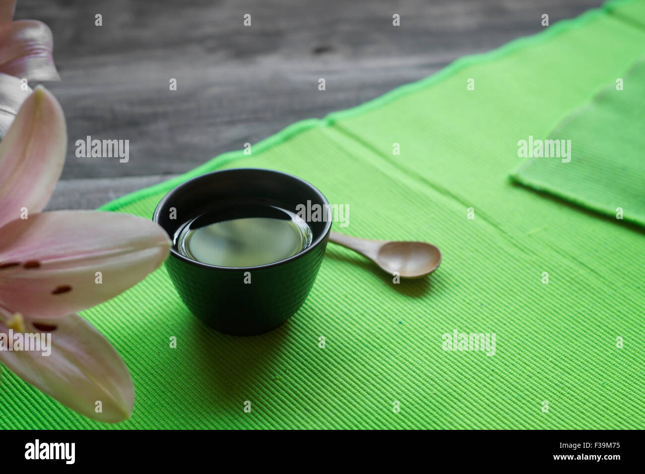 Asian tea cup and spa settings on wooden board, close up Stock Photo ...