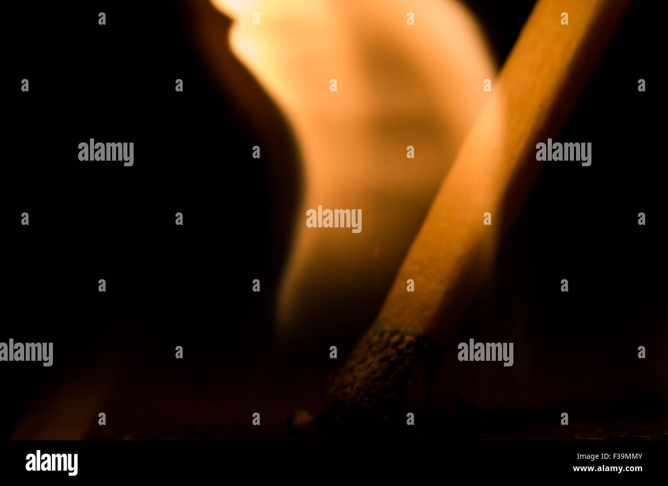 Struck Match shows motion, fire, and black background Stock Photo - Alamy