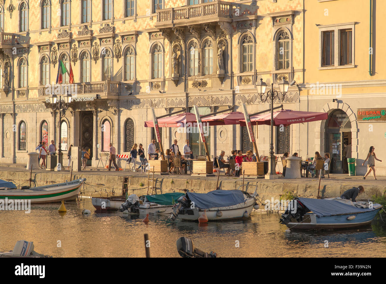 Trieste bar tourists, tourists enjoy refreshment beside the Canal ...