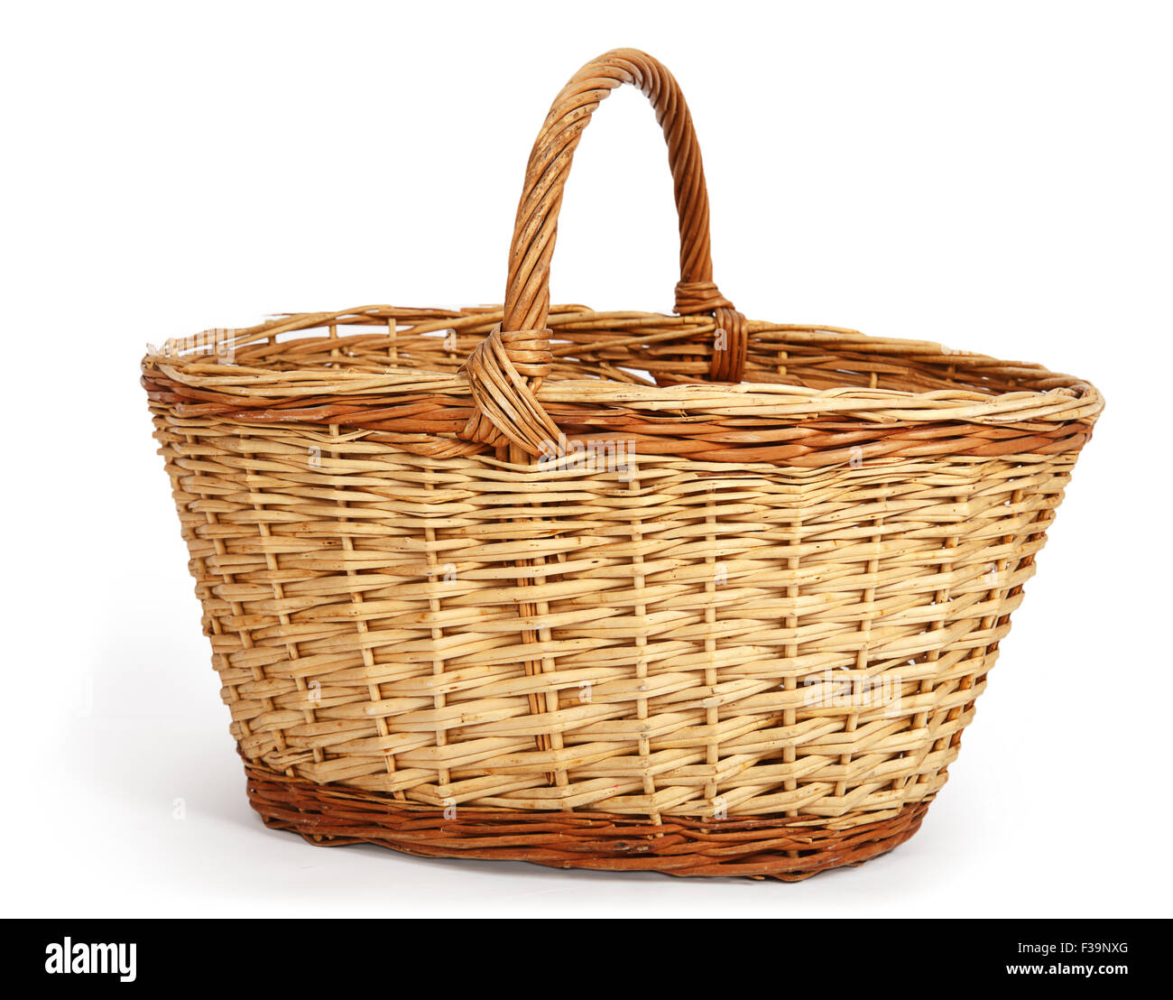 Empty large wicker basket isolated on white background Stock Photo - Alamy