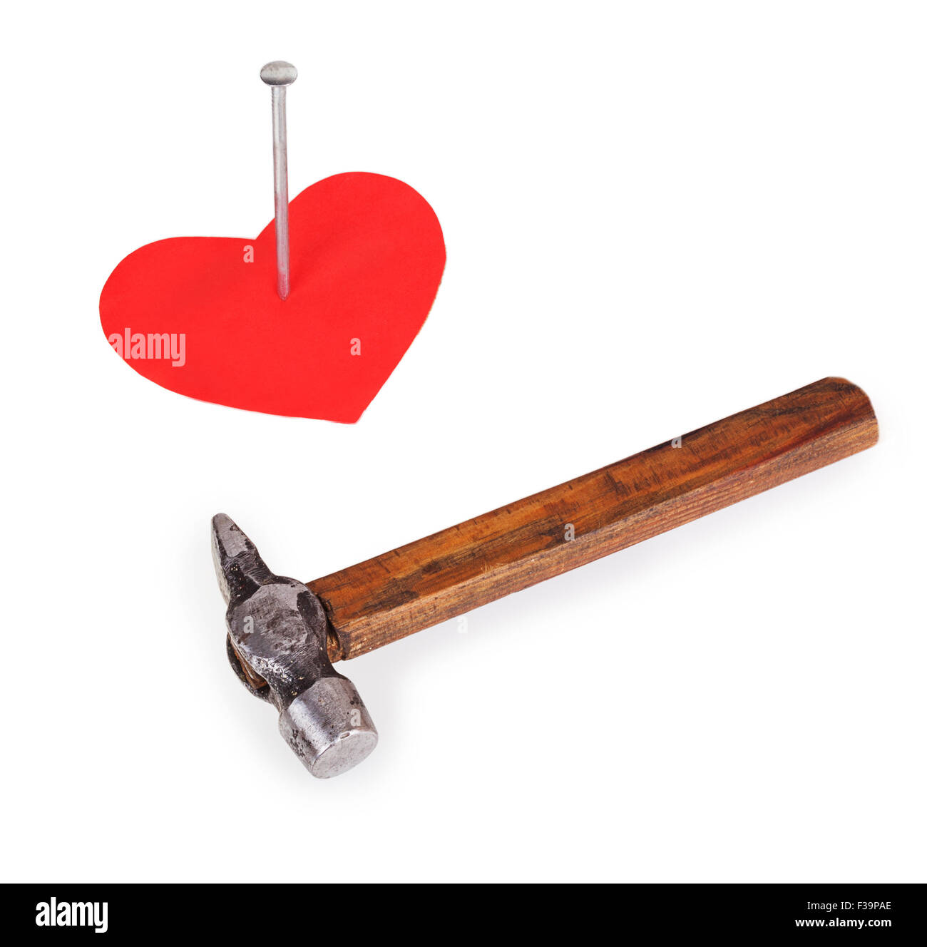 hobnail in a red heart and a hammer isolated on white background Stock ...