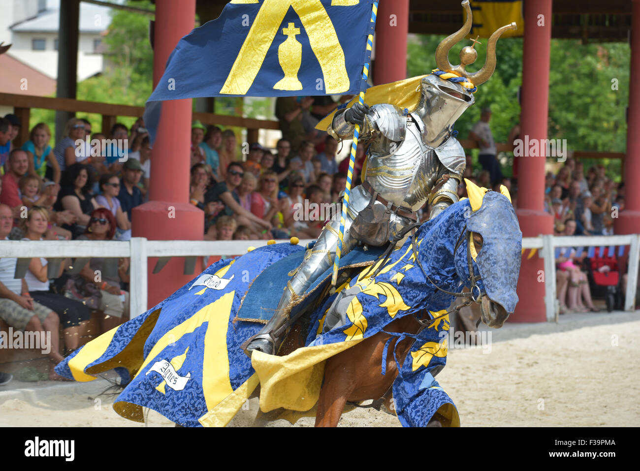 Modern knight on the horse in front of the tribunes. Knights ...