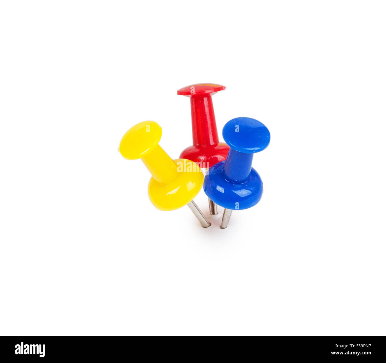 three push pins isolated on white background Stock Photo - Alamy