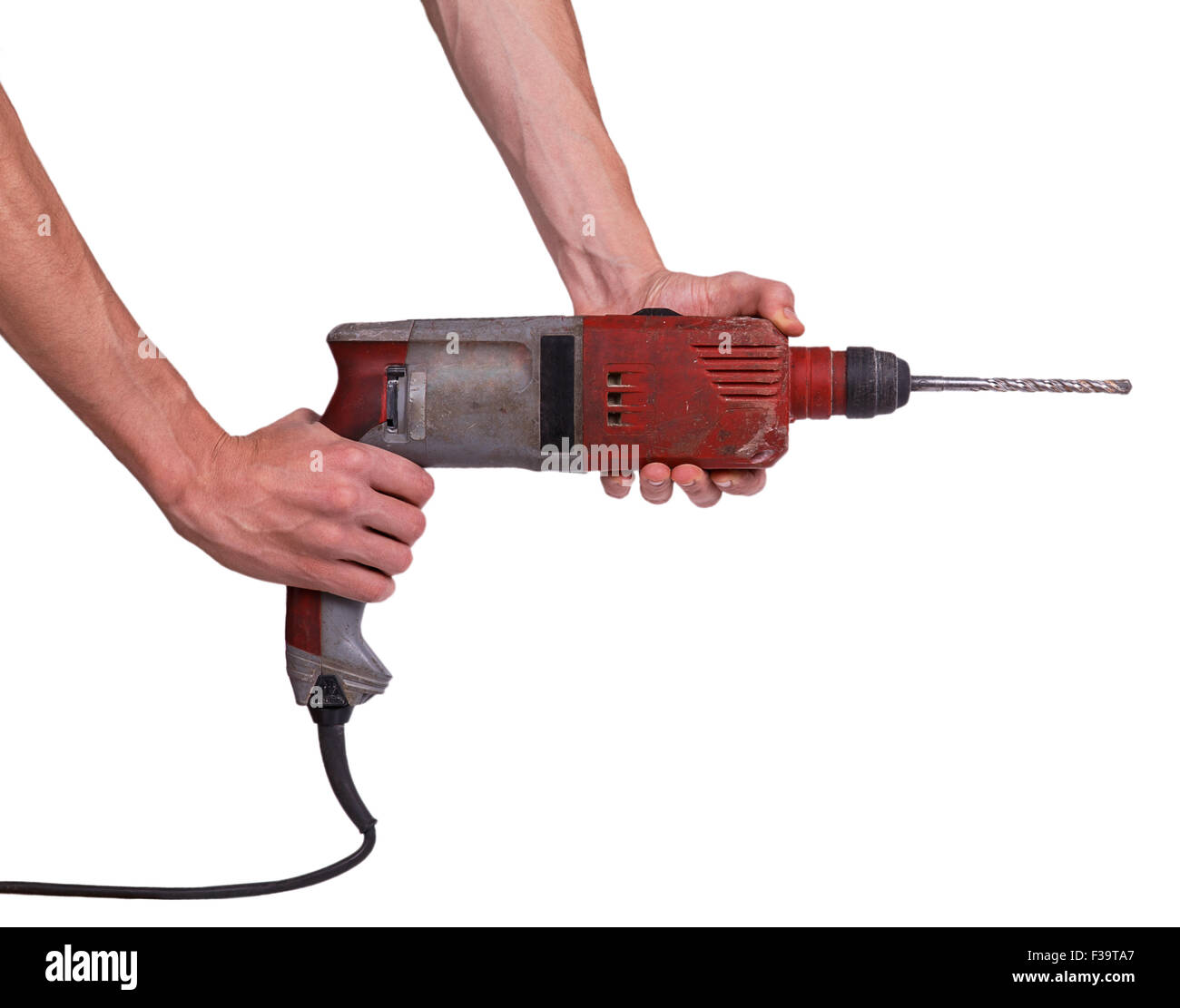 Man's hands holds a brown drill isolated on white background Stock ...