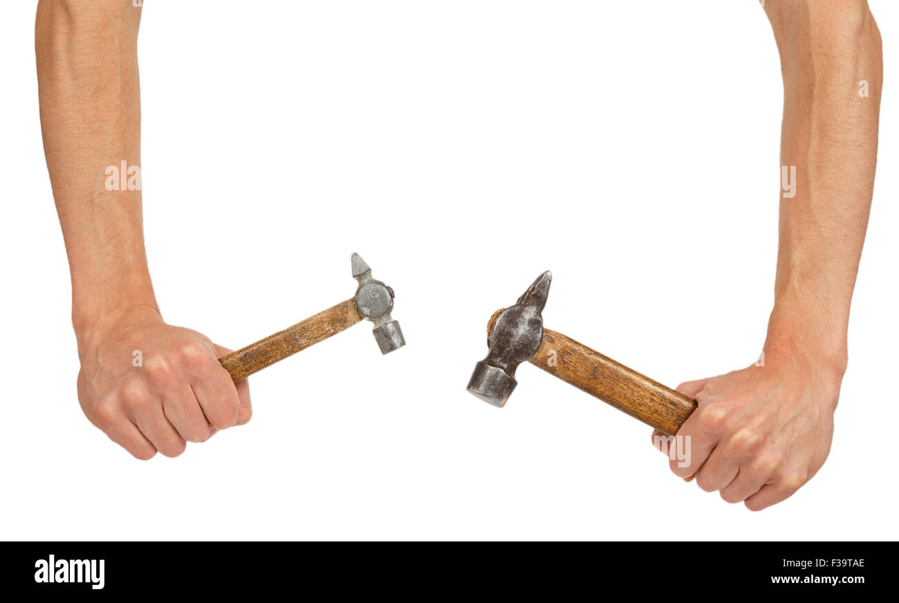 Two old hammers in hands isolated on white background Stock Photo - Alamy