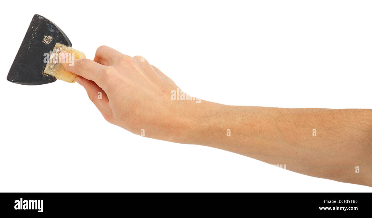 Old trowel in male hand isolated on white background Stock Photo - Alamy