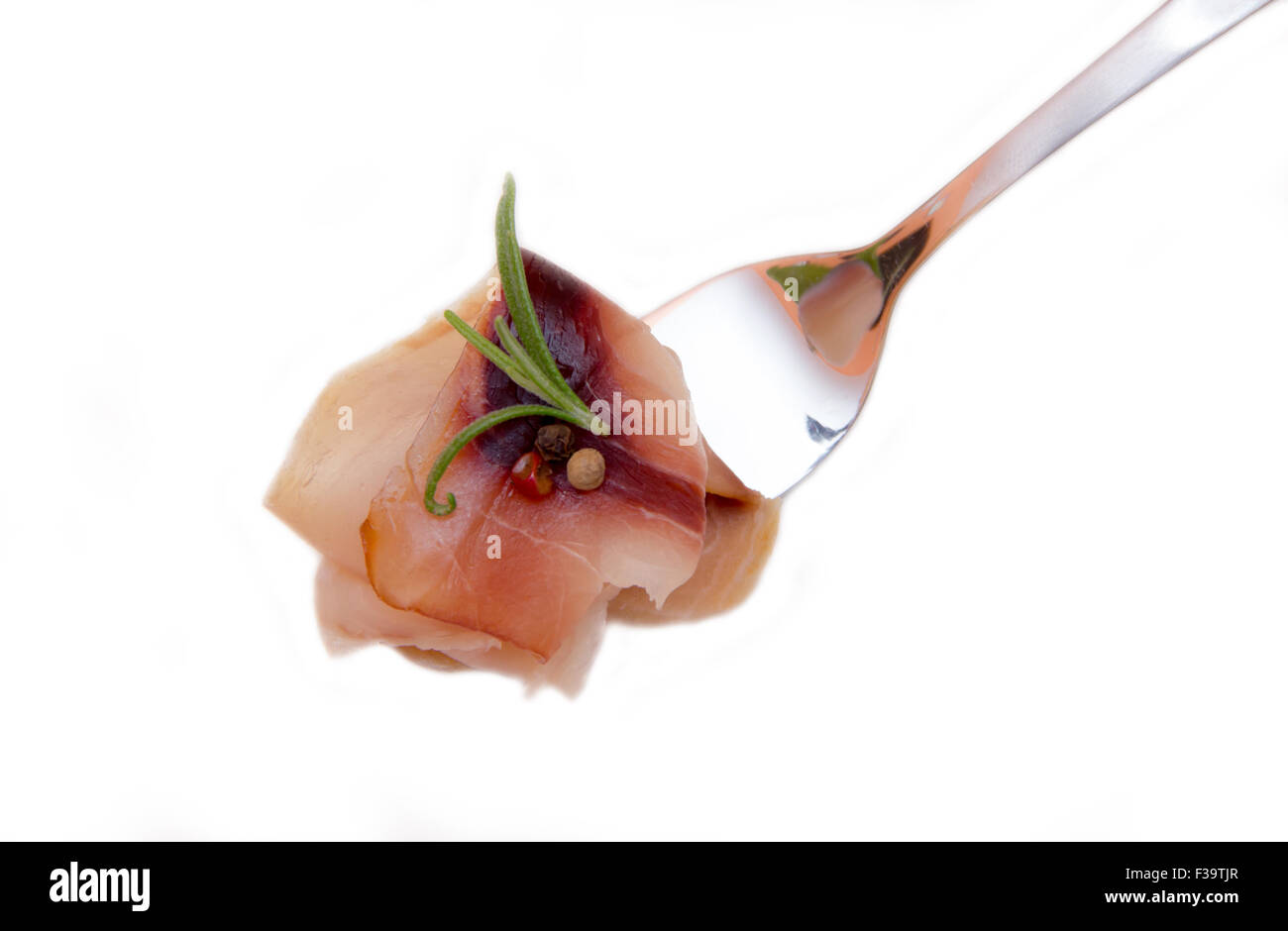 Smoked swordfish on fork on white background seen from above Stock ...