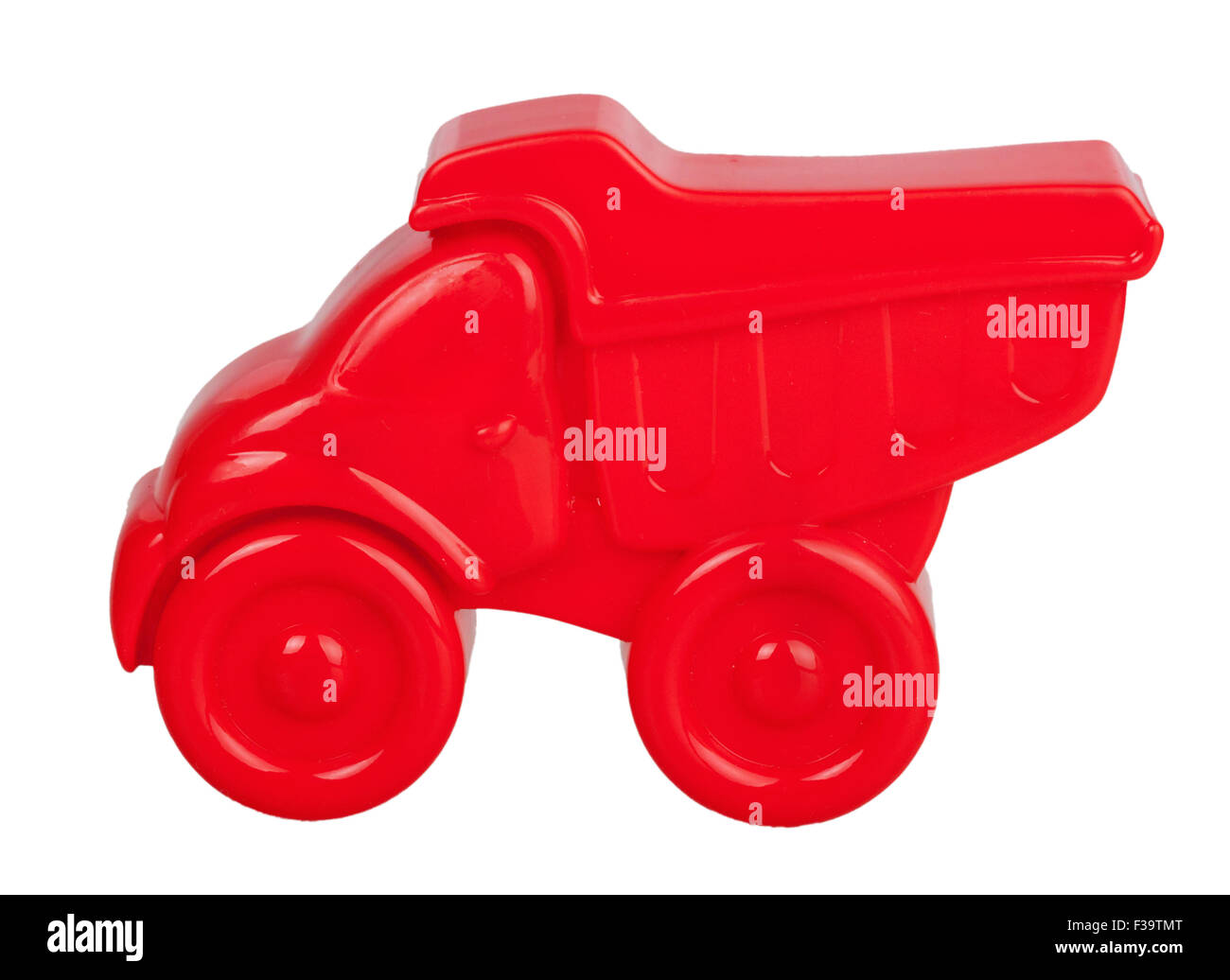 red plastic molding sand isolated on white background Stock Photo - Alamy