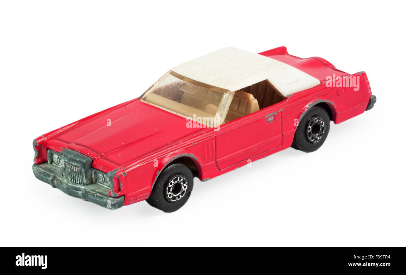 red children's toy car model with white roof isolated on white ...