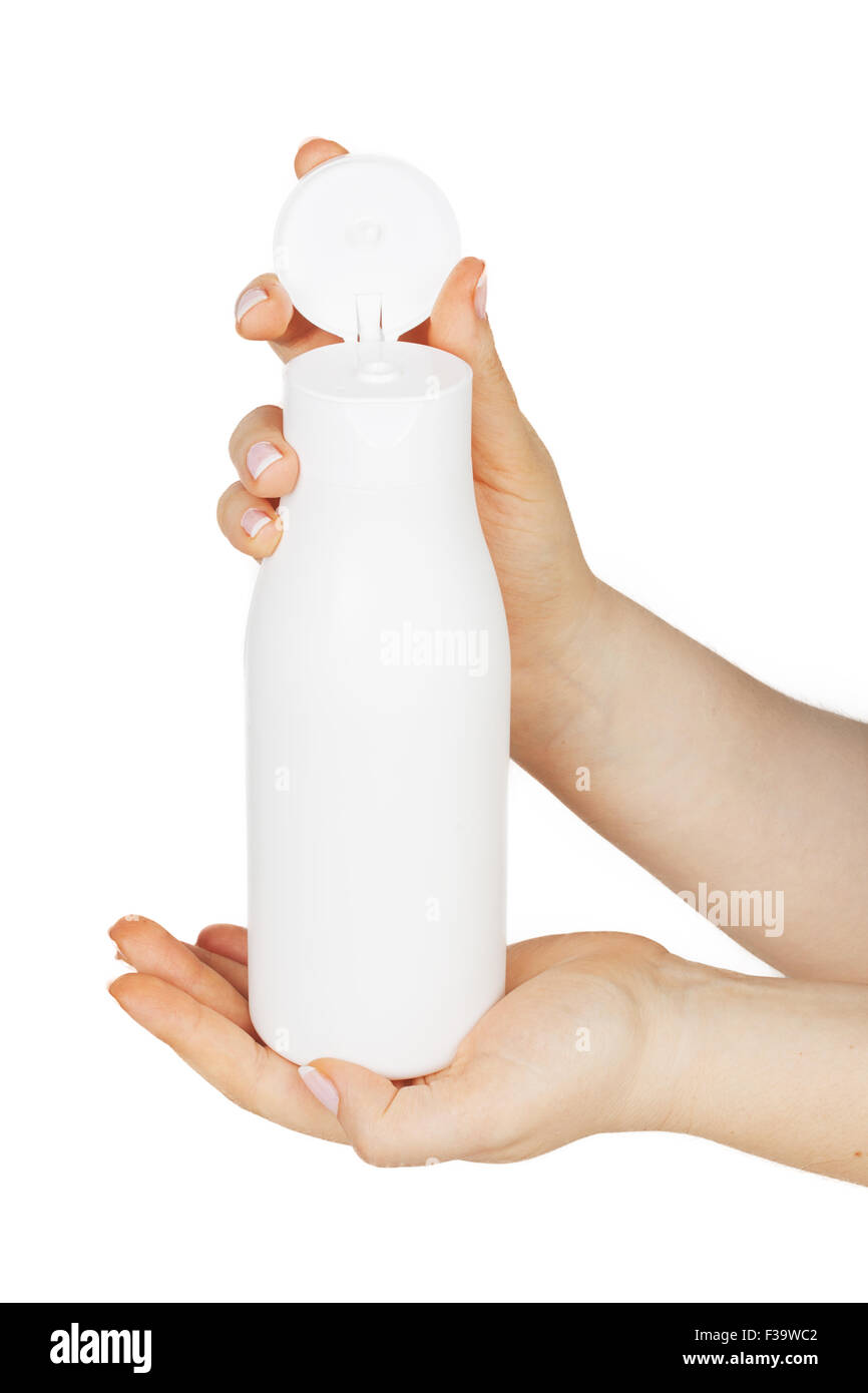 female hand holding white plastic container bottle isolated on white ...