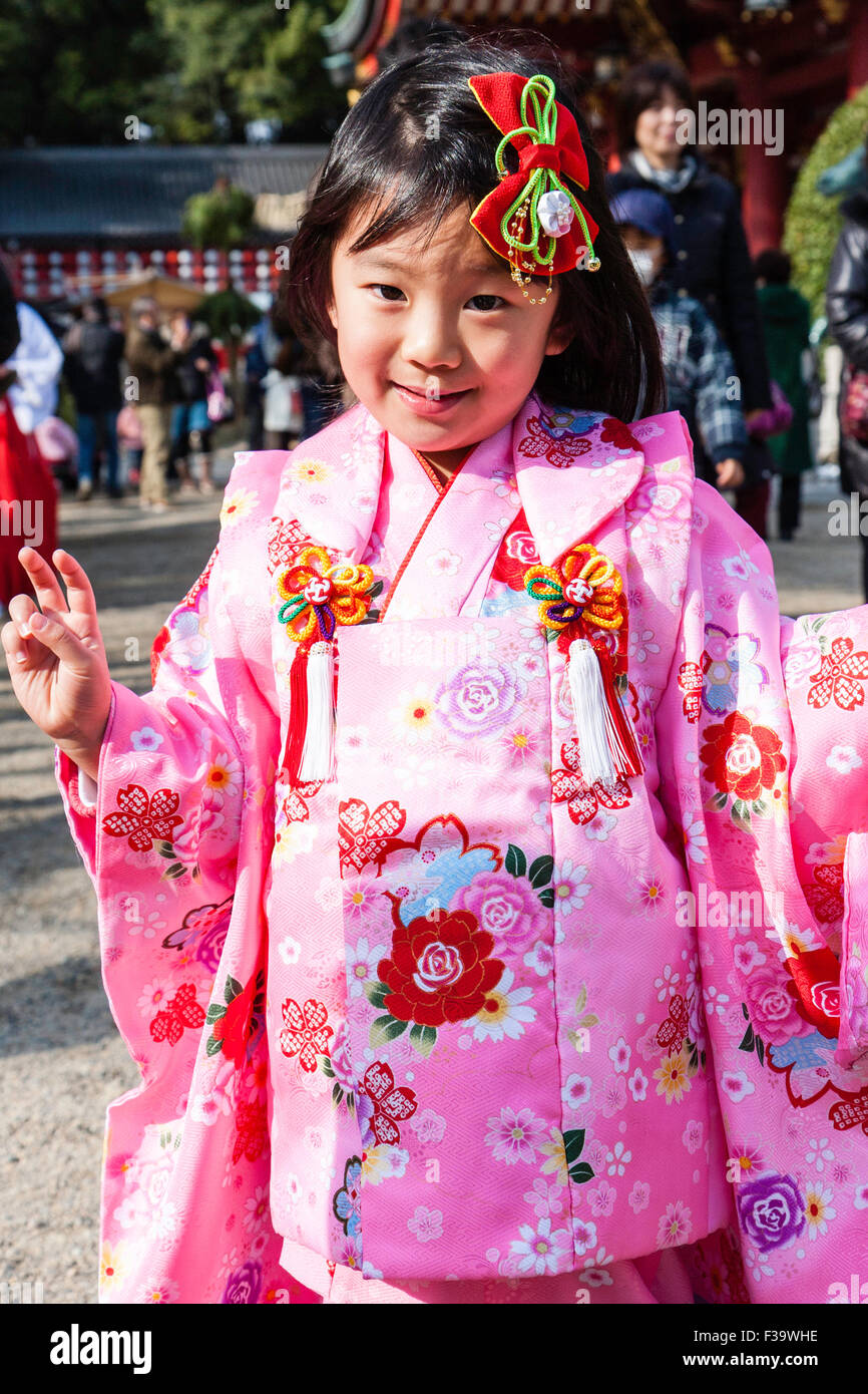 Japanese child, girl,4-5 years old, outdoors in winter sunlight, posing ...