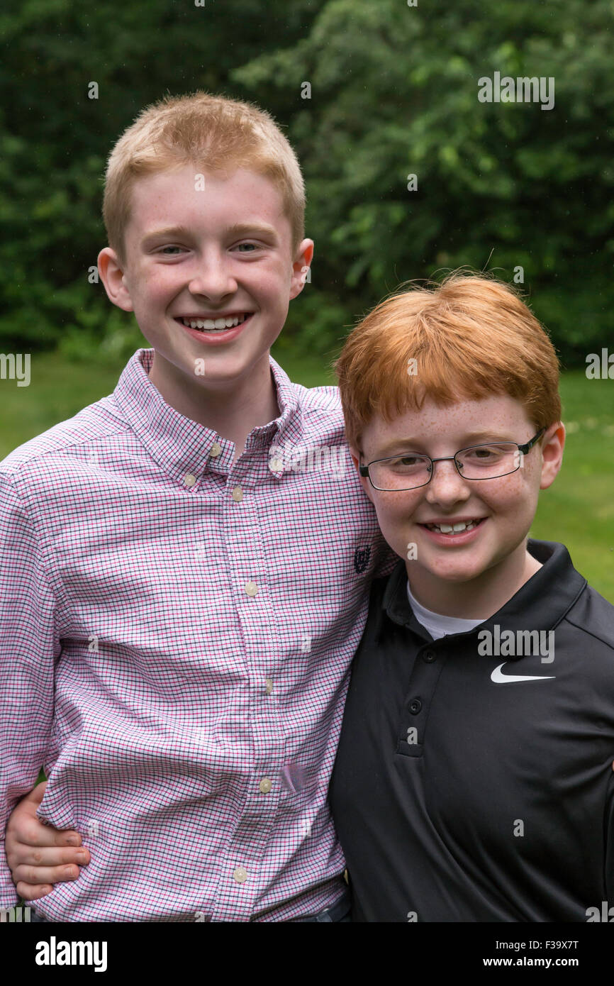 Brothers Smiling at Camera, USA Stock Photo - Alamy