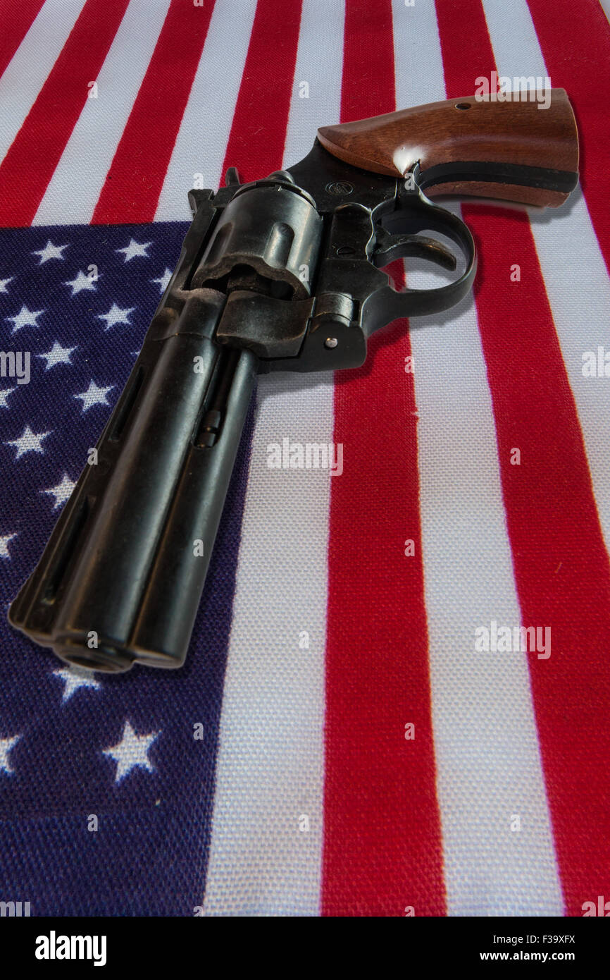 handgun infront of the US flag Stock Photo - Alamy