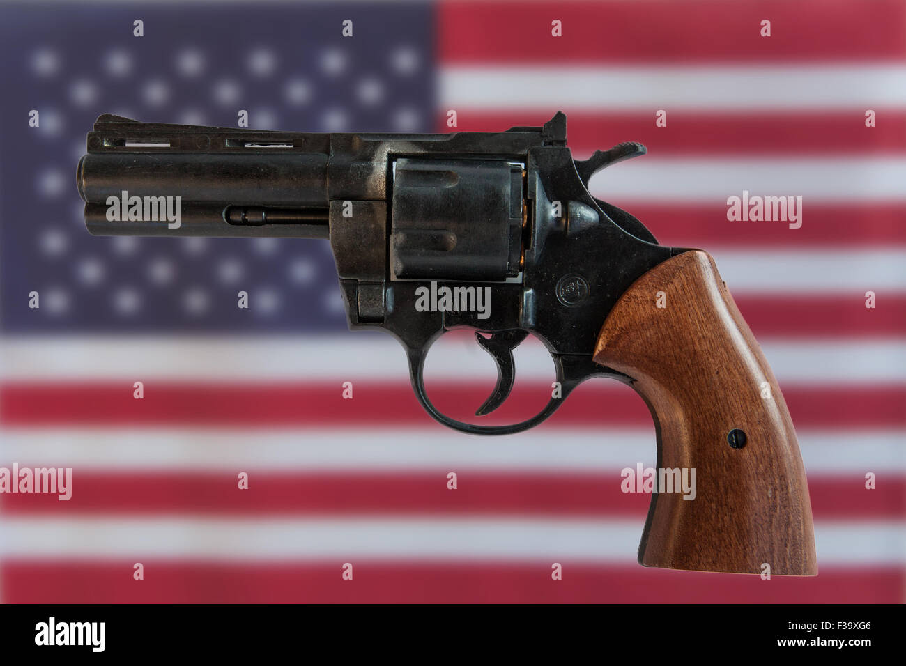 handgun infront of the US flag Stock Photo - Alamy