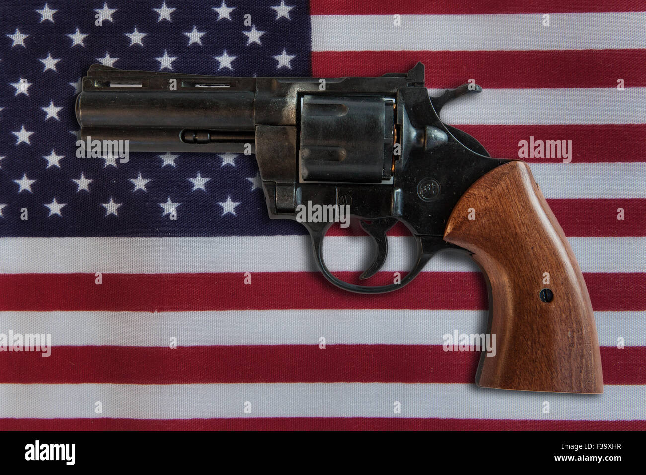 handgun infront of the US flag Stock Photo - Alamy