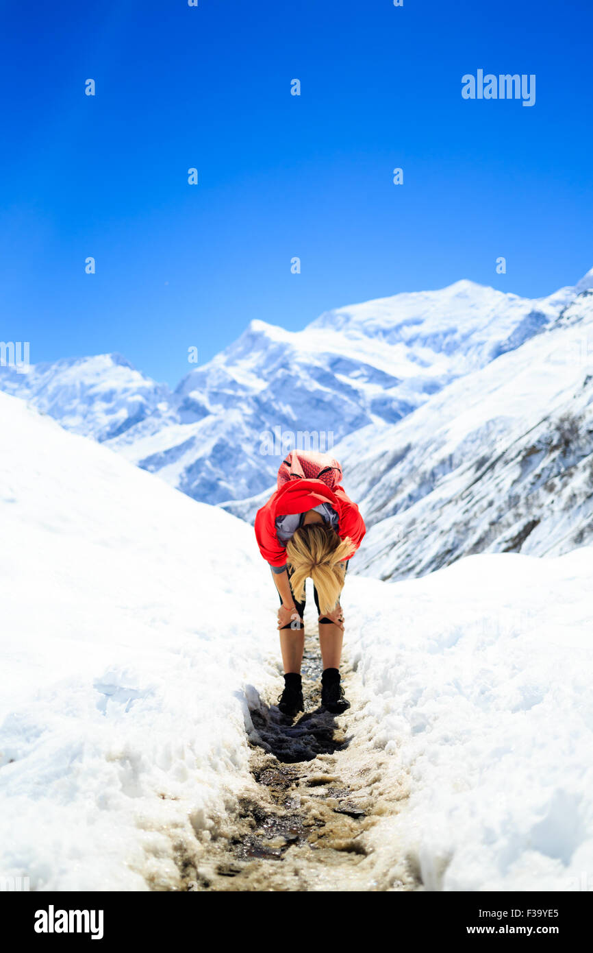 Young tired woman hiker, hiking effort when walking in beautiful ...