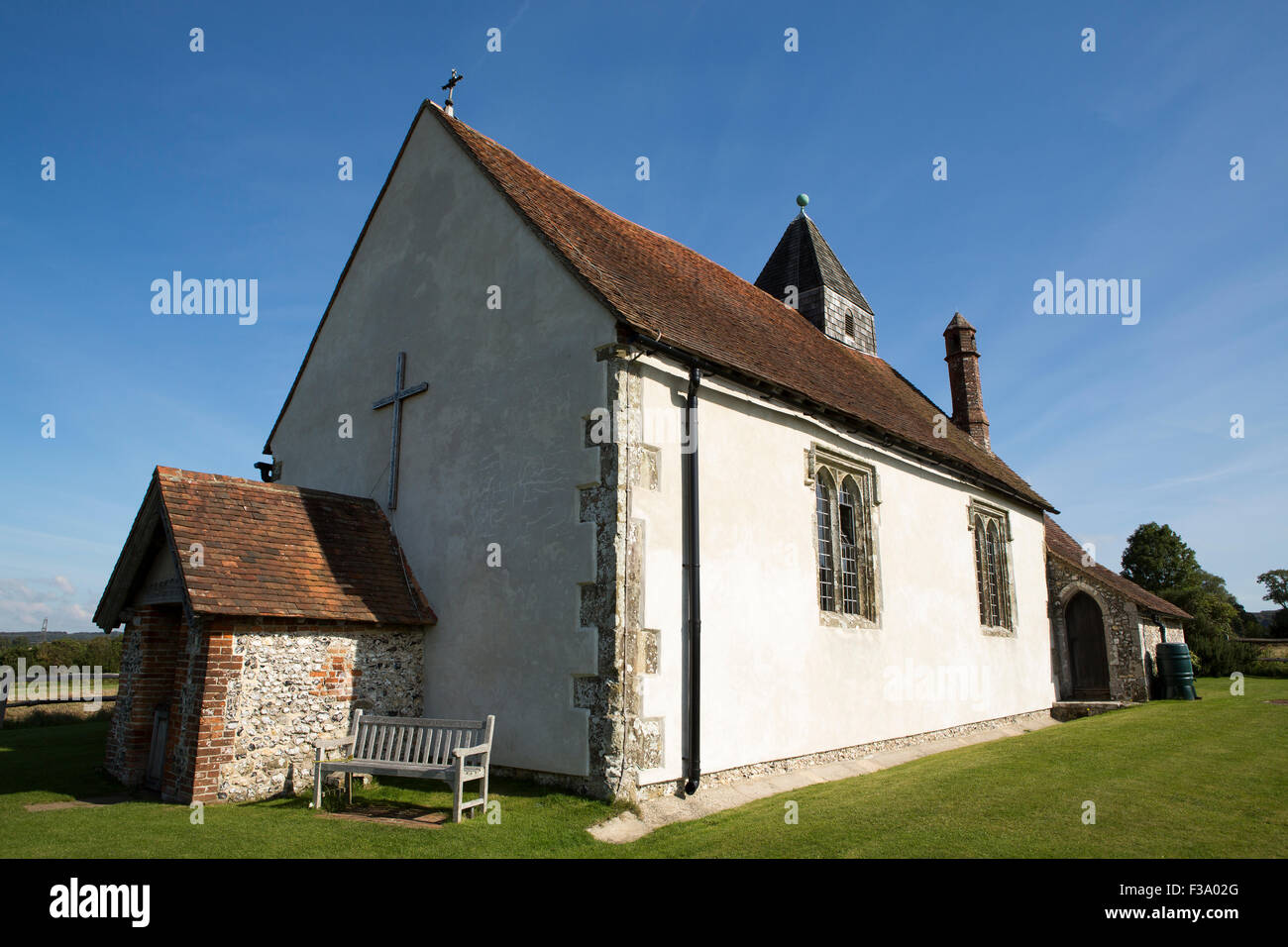 Church in the field at Idsworth. Right side view of St Huberts on a ...