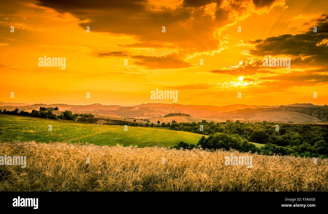 Amazing sunset and dramatic sky in Tuscany, Italy Stock Photo - Alamy