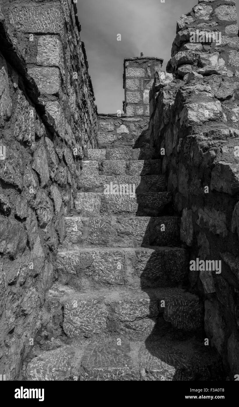 Upward view of stone steps leading to Castle Turret Stock Photo - Alamy