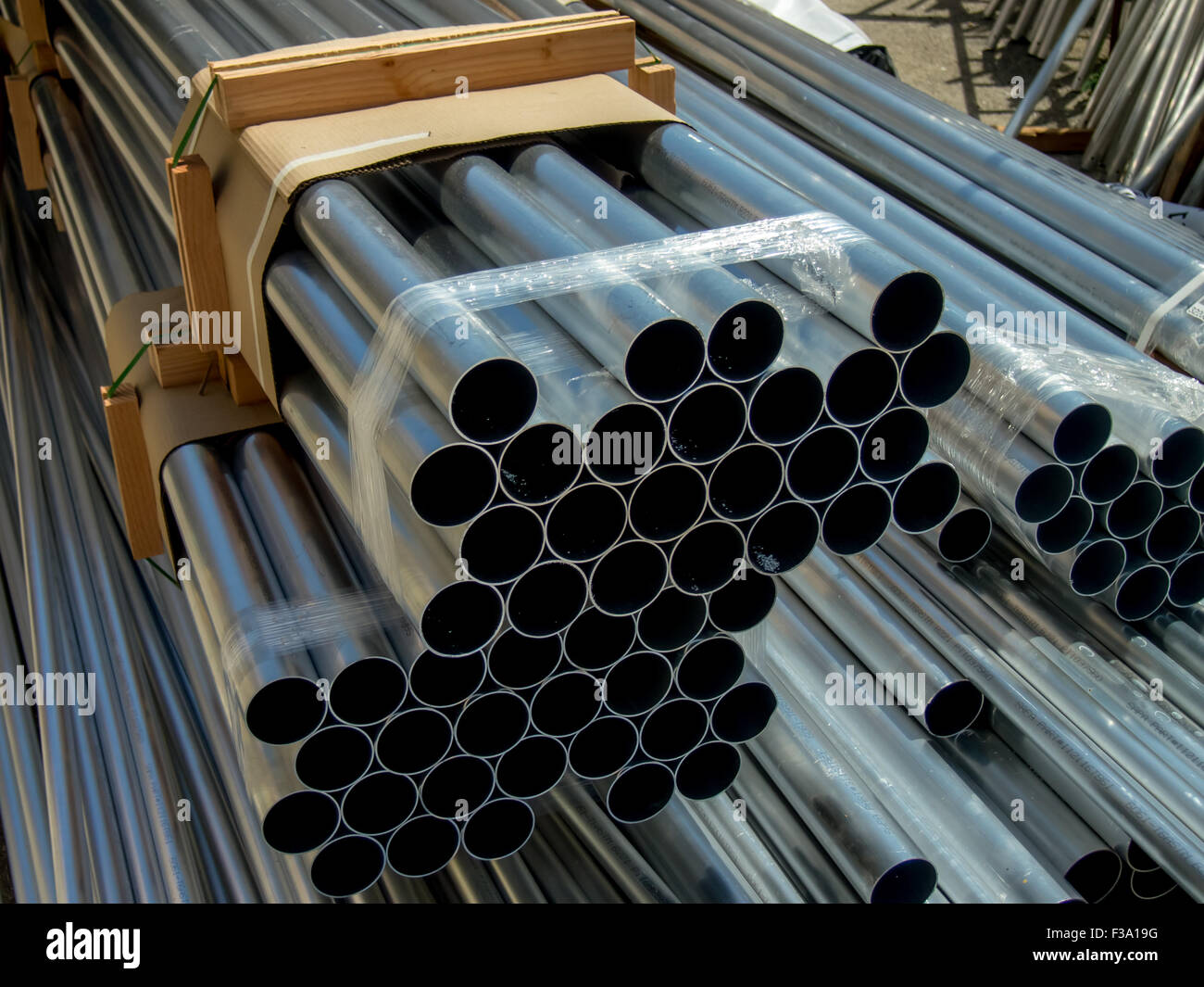 Stack of Many Pipes at the Construction Site Stock Photo - Alamy