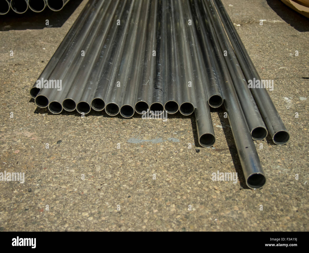 Stack of Many Pipes at the Construction Site Stock Photo - Alamy