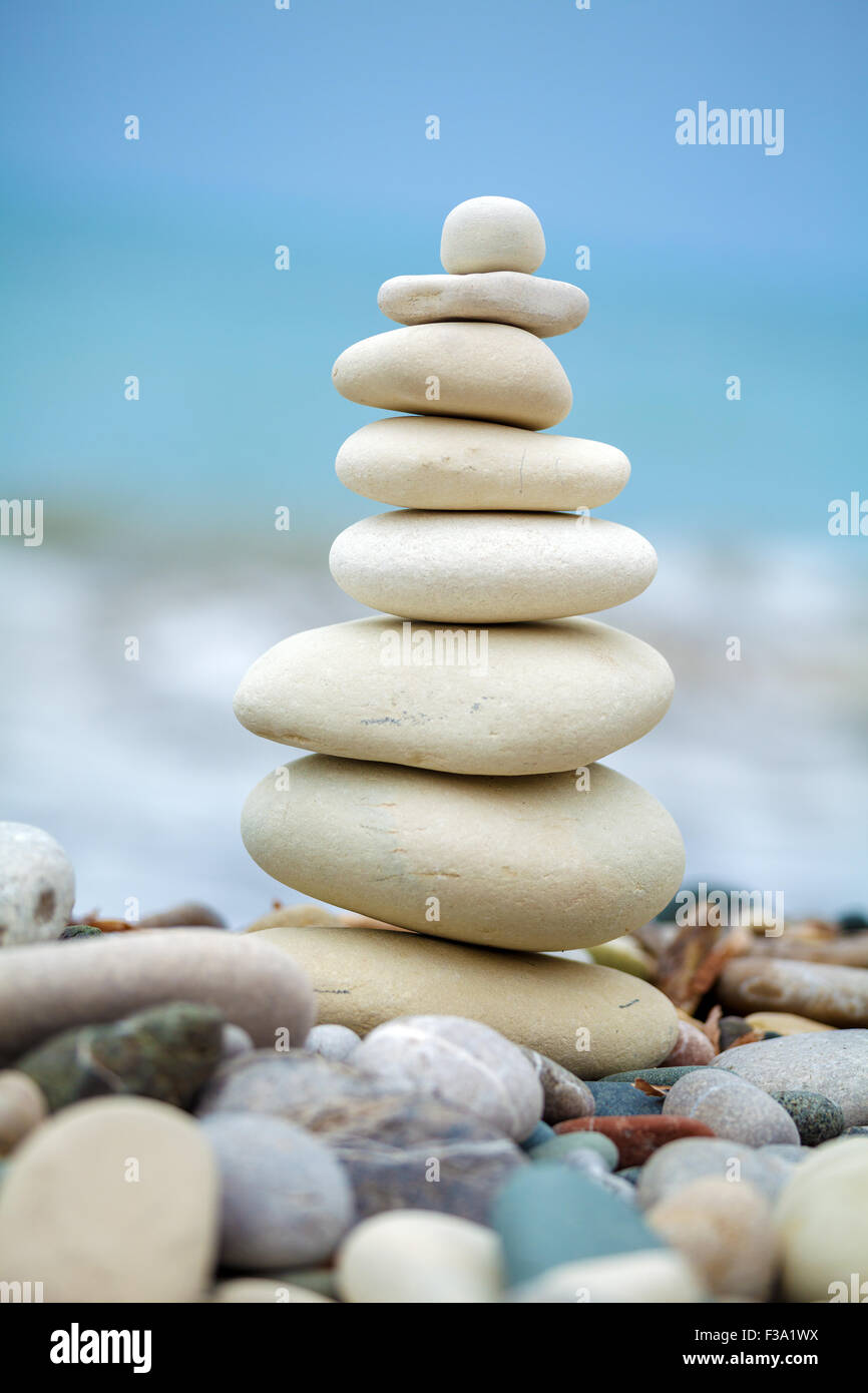 Pyramid of stones on Cyprus beach Stock Photo - Alamy