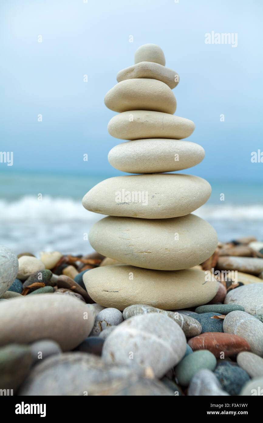 Pyramid of stones on Cyprus beach Stock Photo - Alamy