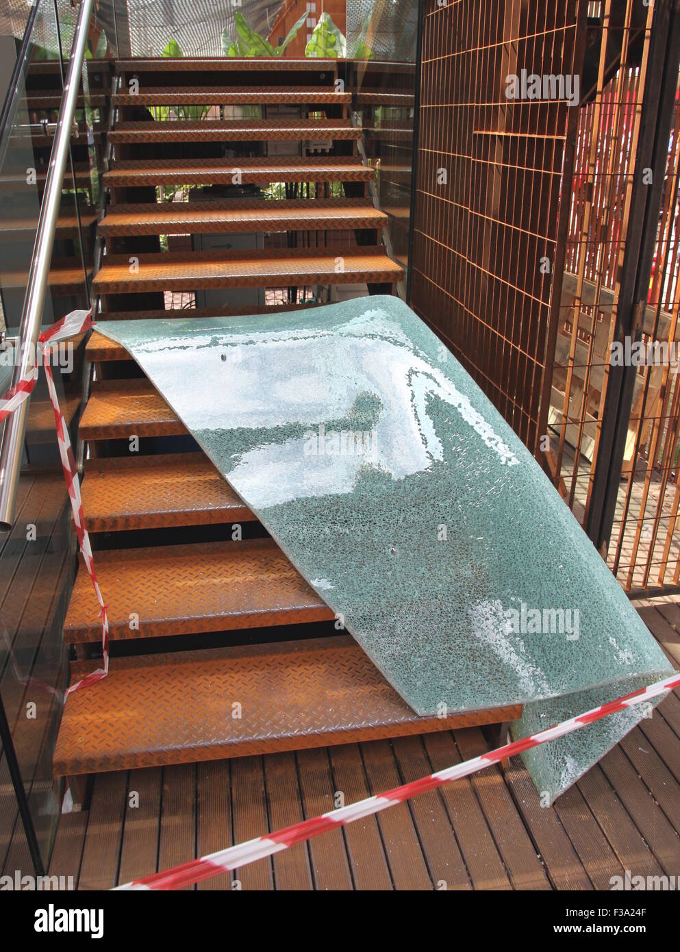 Shattered glass on wooden steps Stock Photo - Alamy