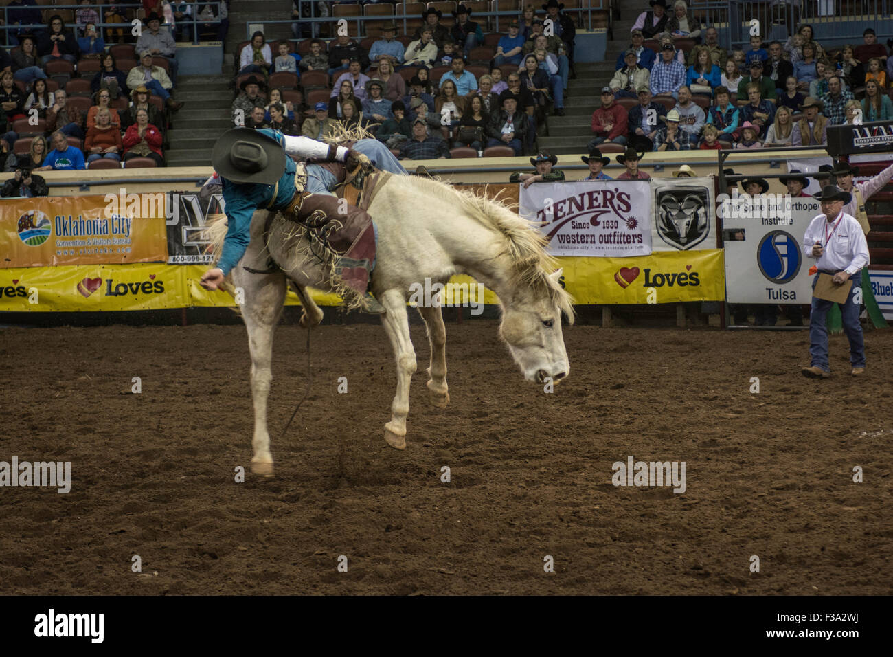Rodeo cowboy falling off horse hi-res stock photography and images - Alamy