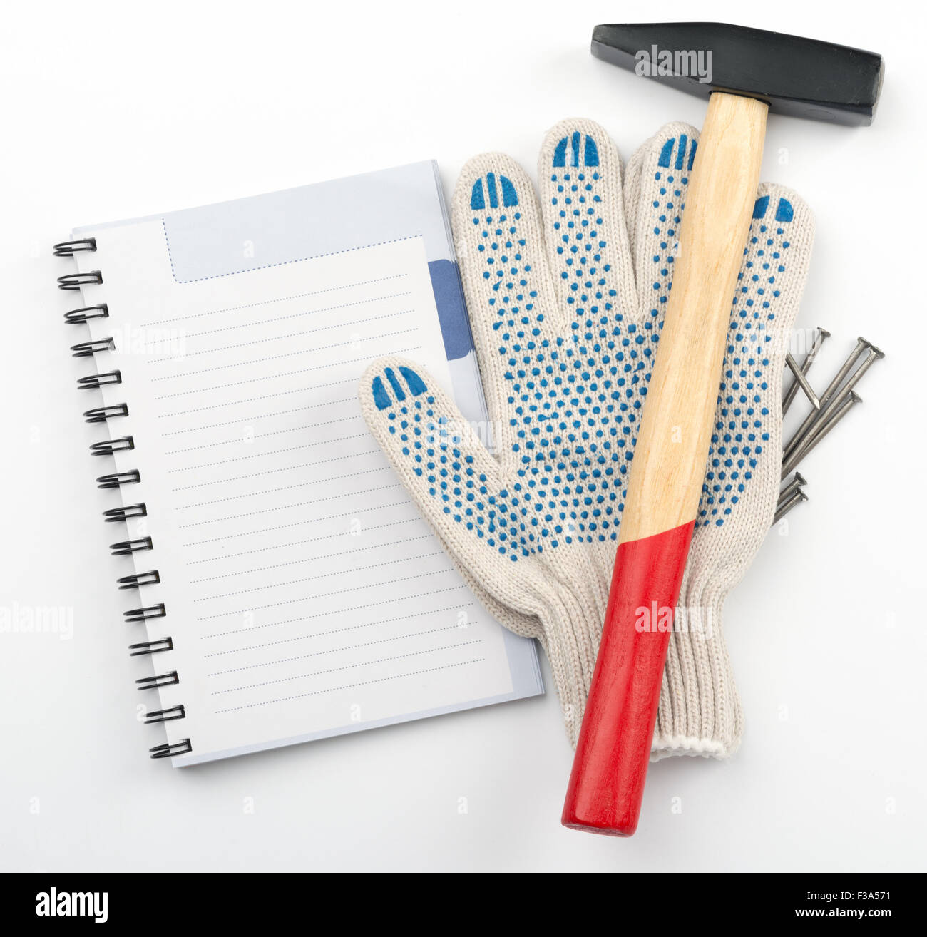 Copy book with hammer Stock Photo - Alamy