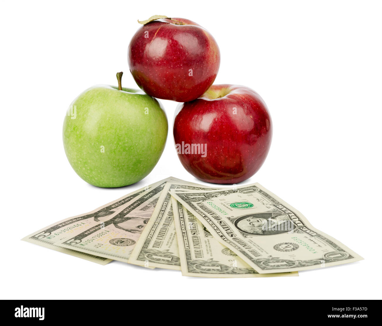 Apples with money Stock Photo - Alamy