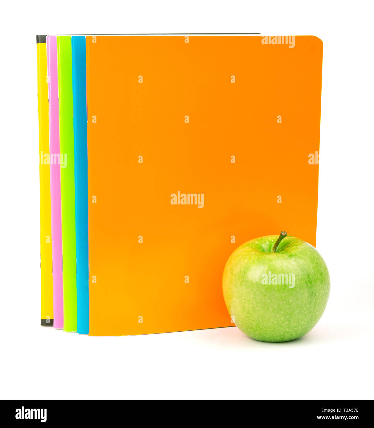 Fresh apple with exercise books Stock Photo - Alamy