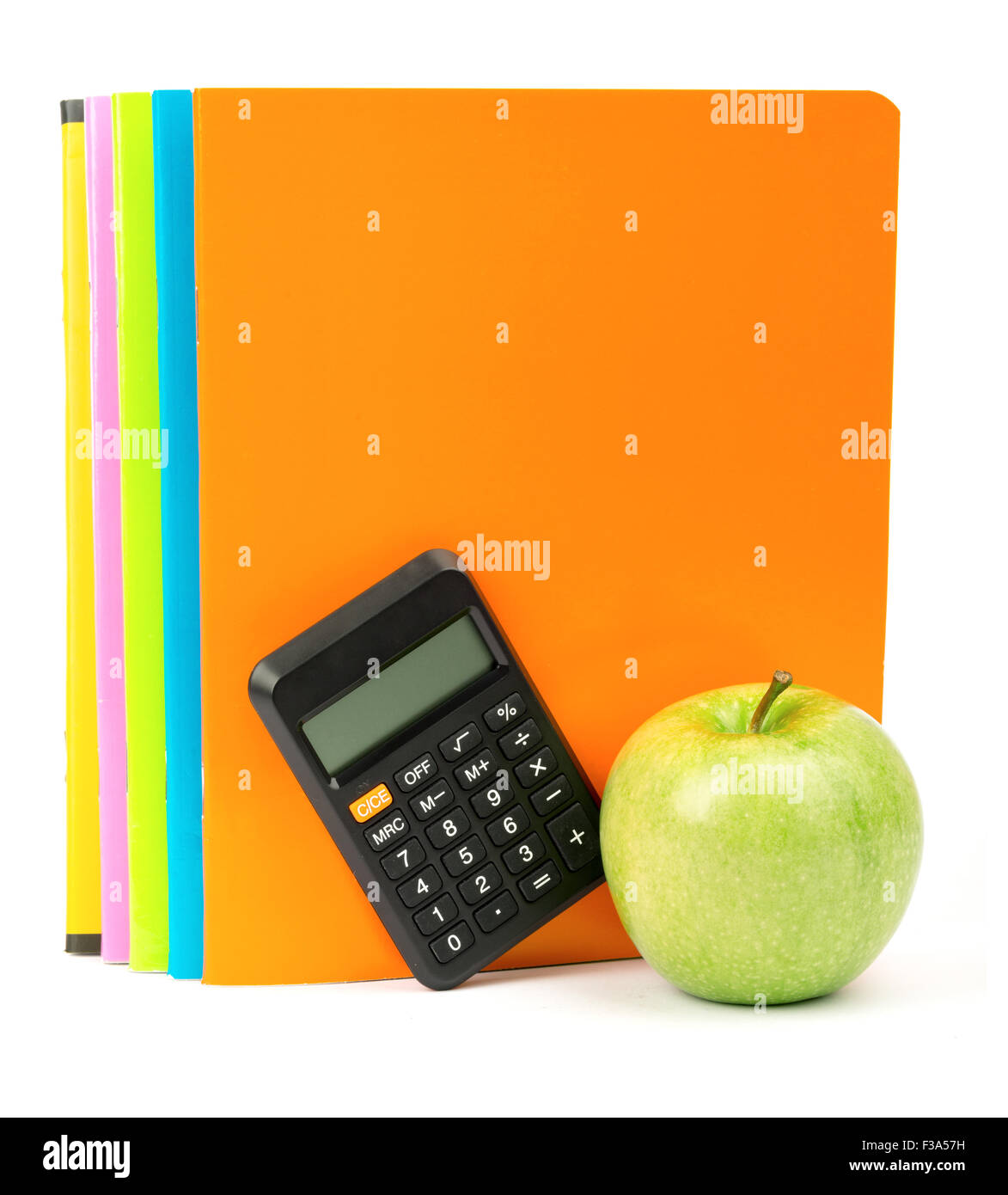 Fresh apple with exercise books and calculator Stock Photo - Alamy Fresh apple with exercise books and calculator Stock Photo - Alamy