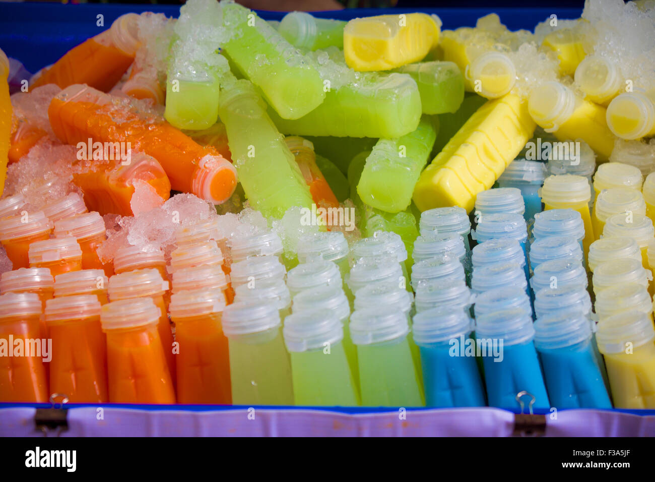 bottles of fruit juice with different color Stock Photo - Alamy