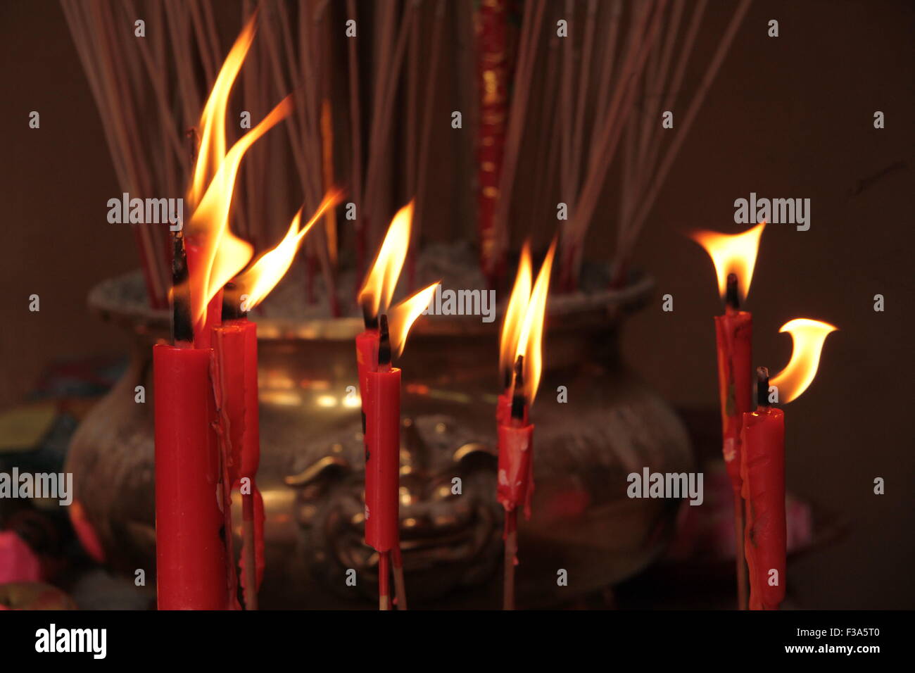 Red incense hi-res stock photography and images - Alamy