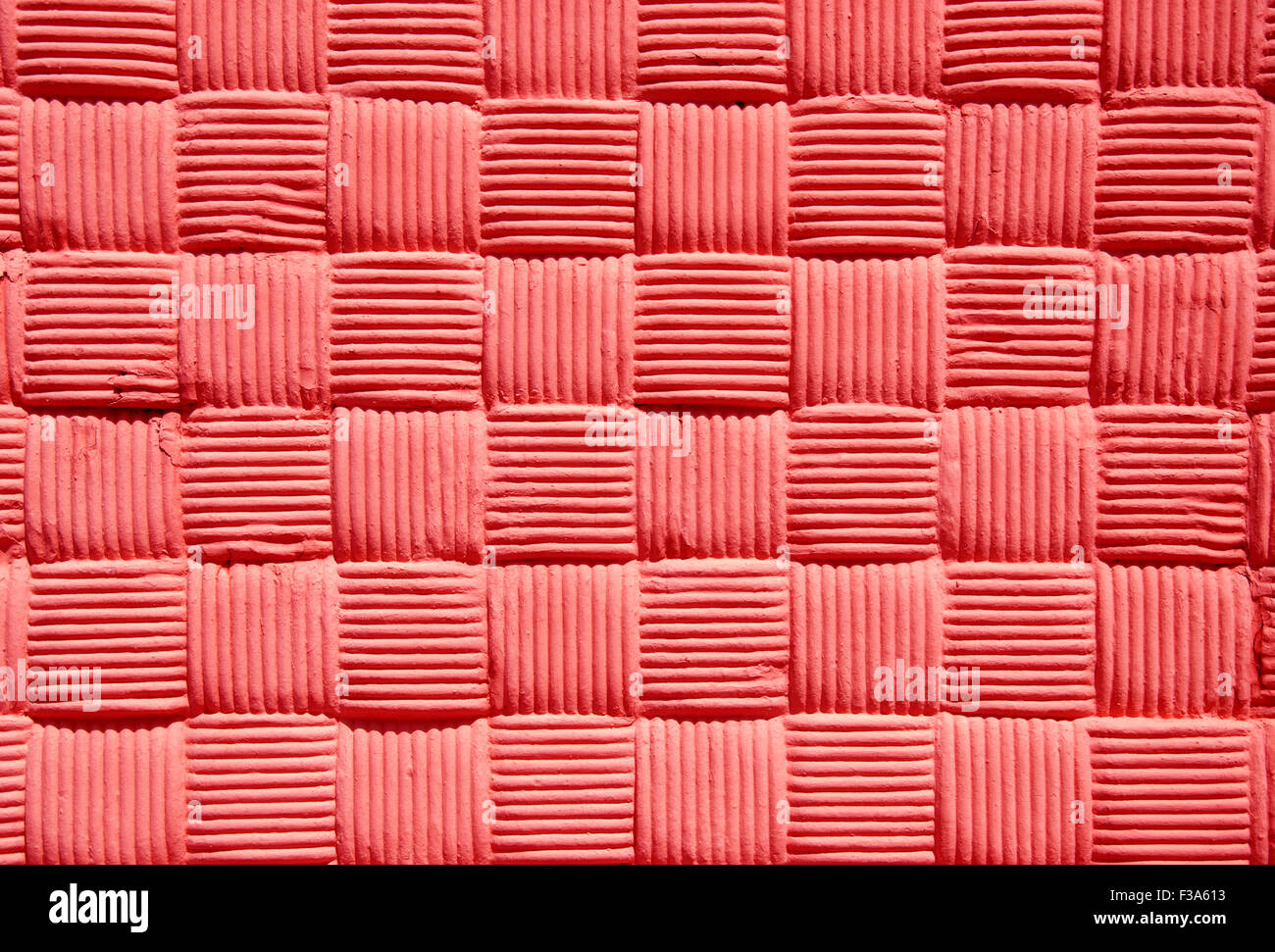 Pseudo woven pink wall background and texture Stock Photo - Alamy