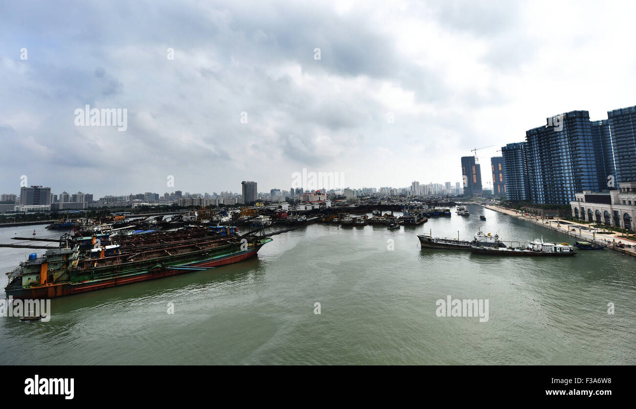 Haikou, China's Hainan Province. 3rd Oct, 2015. Ships berth at Xingang ...