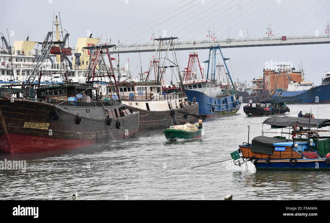 Haikou, China's Hainan Province. 3rd Oct, 2015. Ships berth at Xingang ...